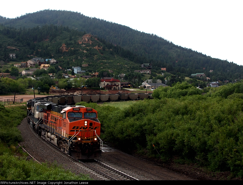 The storm over, BNSF 5968 leads it's train south once again